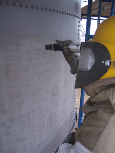 Cleaning Tanks with Abrasive Blasting
